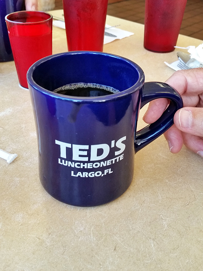 The blue mug says it all&mdash;straightforward coffee that doesn't need fancy Italian names to wake you up and get you moving.