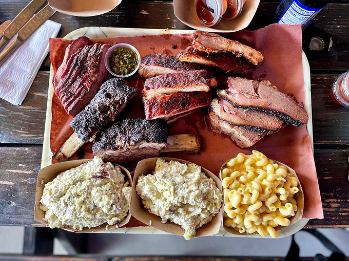 The barbecue sampler plate: where decision anxiety meets its delicious solution. Mac and cheese as a side? Always the right call.