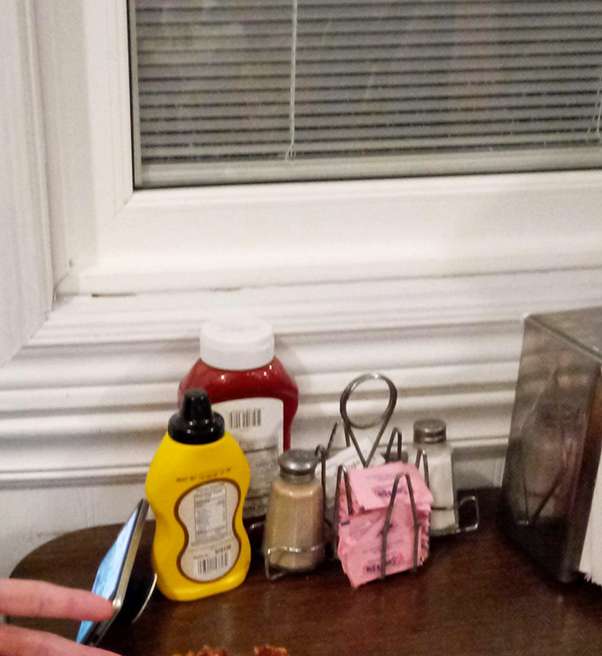 The condiment caddy&mdash;where mustard and ketchup patiently wait to fulfill their destiny on your sandwich, like supporting actors who know their role in the tenderloin show.