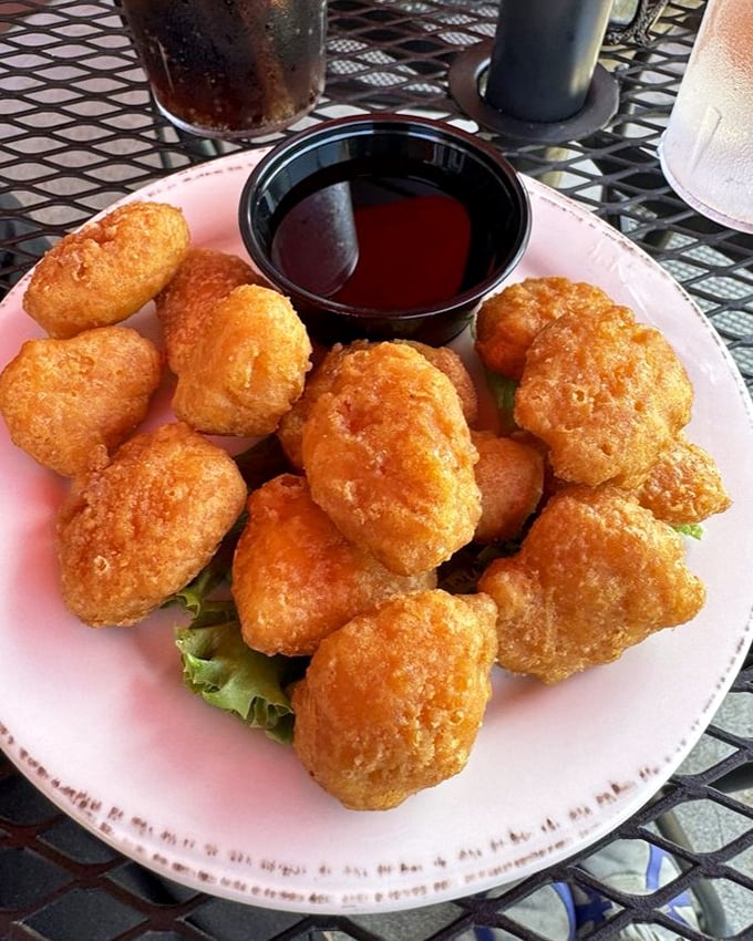 These aren't just corn nuggets&mdash;they're little golden orbs of happiness, crispy outside and sweet inside. The dipping sauce is just showing off at this point.