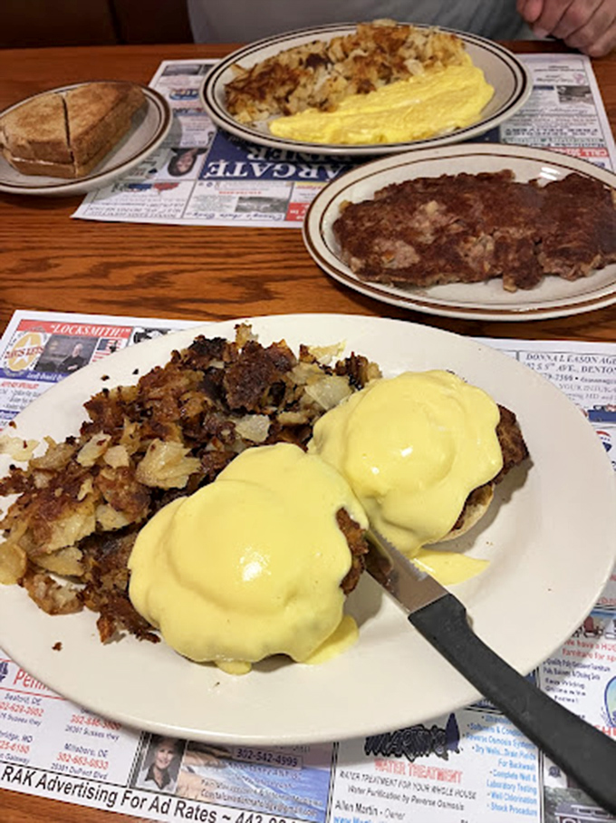 Eggs Benedict gets the coastal treatment with crab and hollandaise. This plate doesn't just feed you&mdash;it hugs your soul.