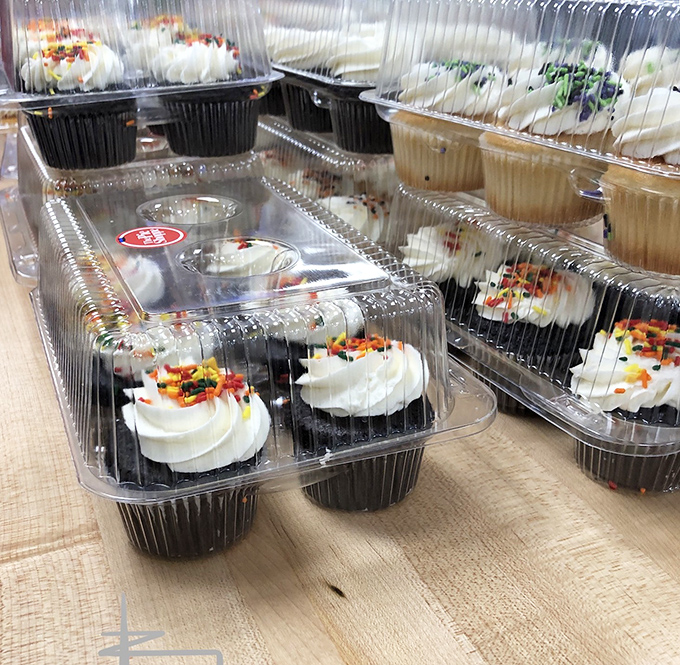 Cupcakes lined up like tiny edible works of art, each one promising a perfect ratio of frosting to cake&mdash;the mathematical equation of happiness.