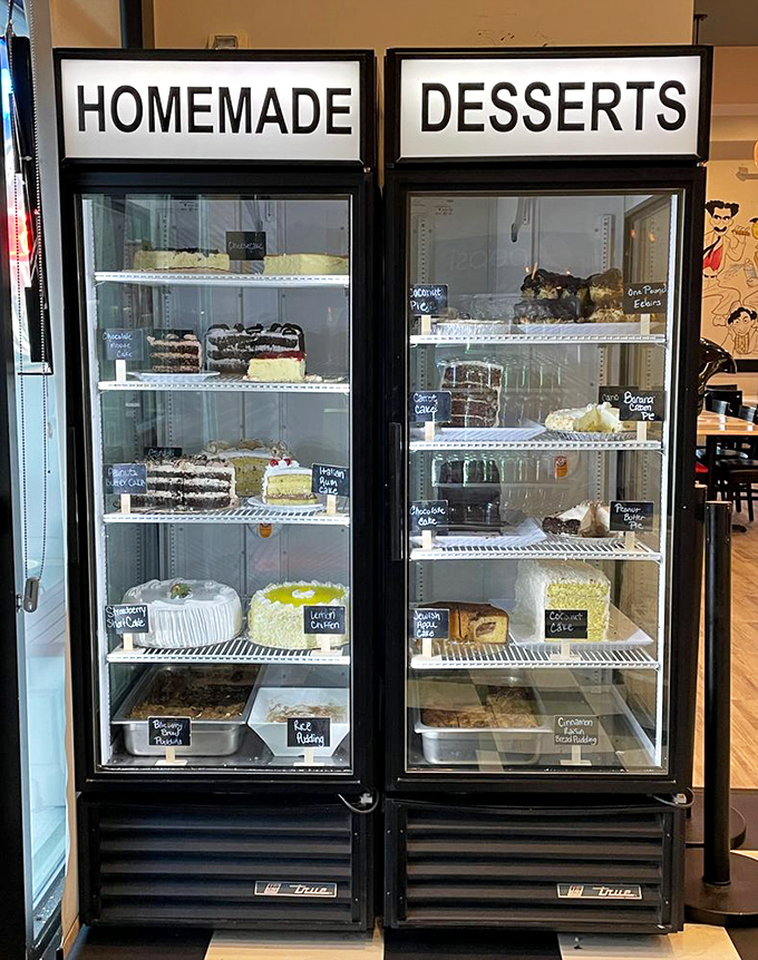 The dessert case&mdash;where willpower goes to die. Each shelf holds sweet treasures that make "I'll just have a bite" the biggest lie you'll tell today.