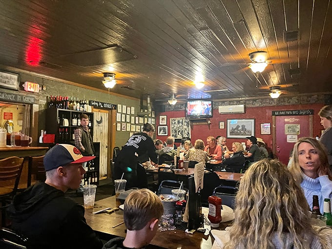 The dining room hums with the energy of people who know they've found something special. Notice the lack of phones&mdash;the food commands full attention.