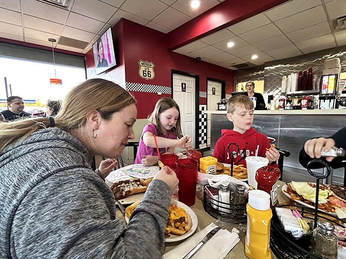 Family diner magic in action—where memories are made between bites and conversations flow as freely as the coffee.