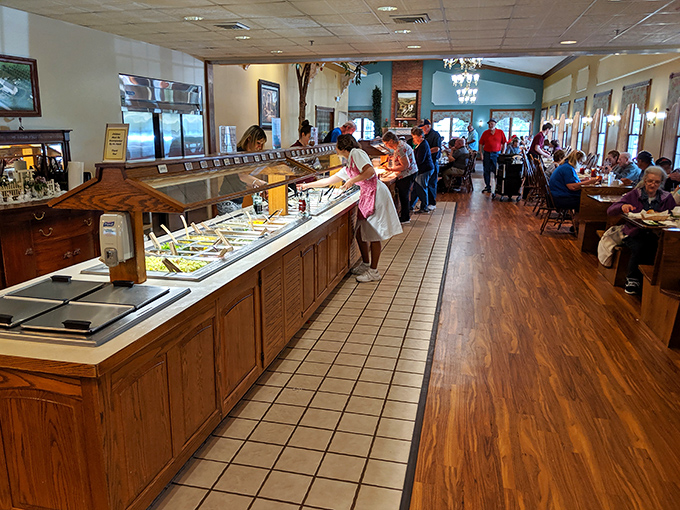 The buffet line at Amish Door&mdash;where patience is rewarded with platters of homestyle cooking. Notice nobody's rushing; they know good things await.
