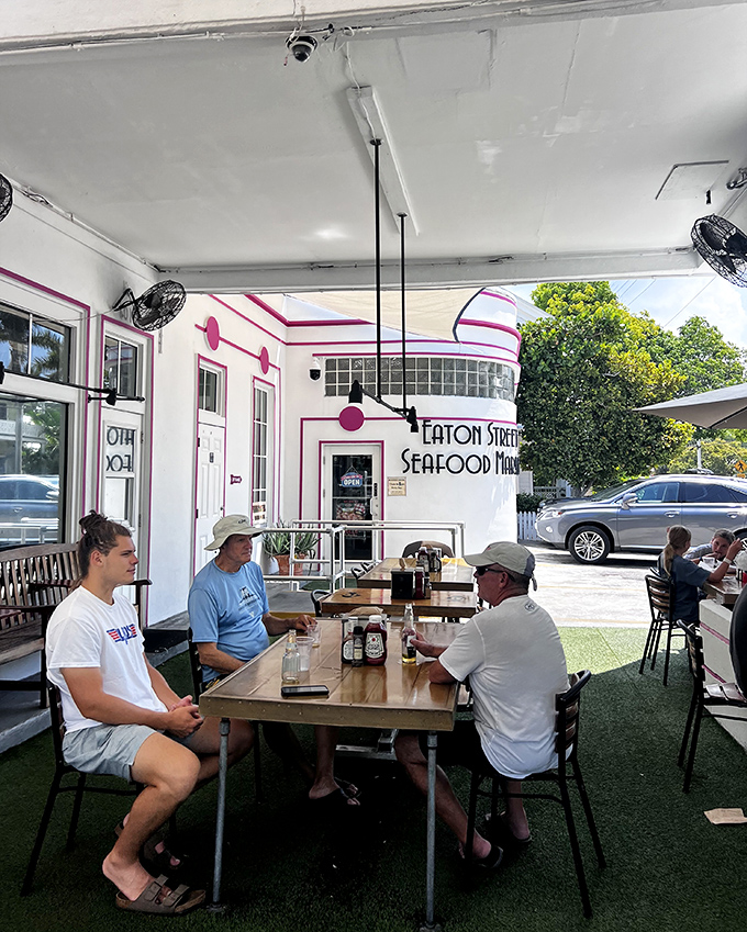 The outdoor dining area—where strangers become friends united by the universal language of "Did you try the lobster roll yet?"