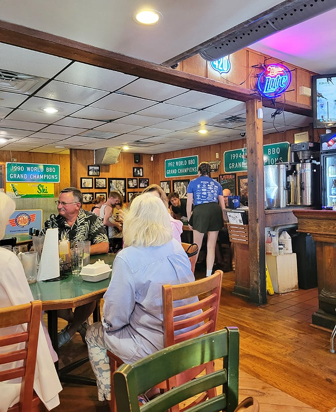 The dining room where strangers become friends, united by the universal language of "mmm" and the occasional sauce-on-shirt mishap.