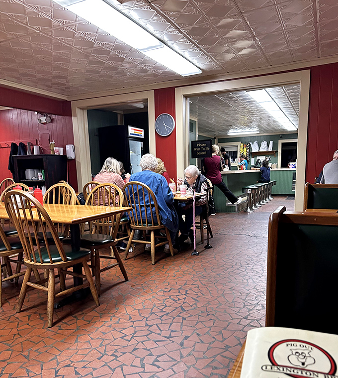 Regulars know the best tables are the ones with the red sauce bottles within arm's reach. This dining room has hosted more joy than most five-star restaurants.