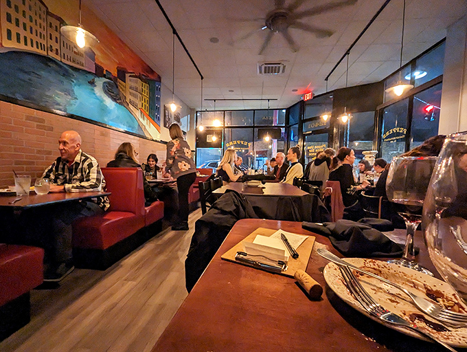 The evening buzz of satisfied diners, clinking glasses, and the warm glow of pendant lights&mdash;dinner theater at its most delicious.