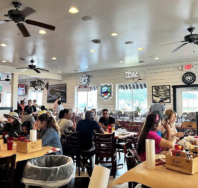 Happy diners in their natural habitat &ndash; notice the strategic bib placement and satisfied expressions.