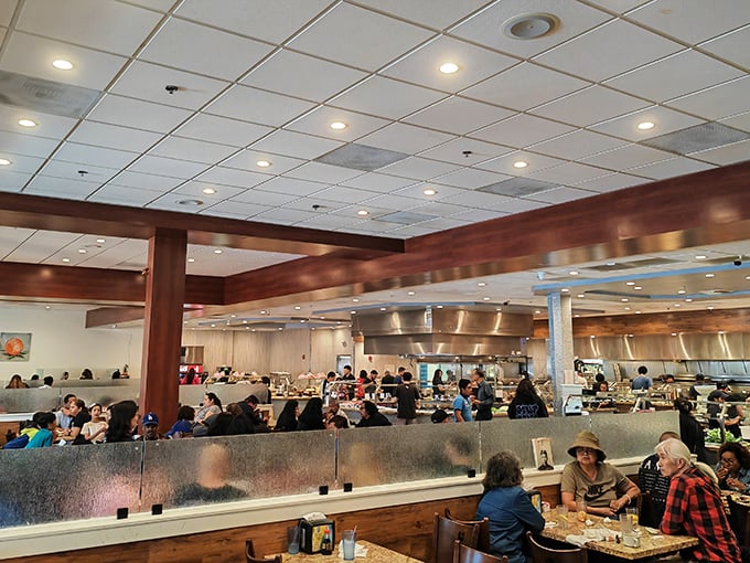 A bustling dining room filled with the universal language of satisfied nods and the occasional "you have to try this" across tables.