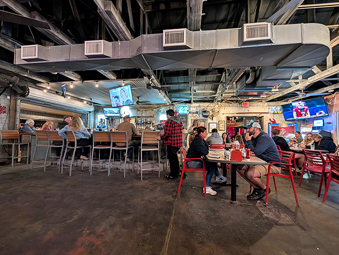 Where locals and visitors unite under exposed rafters, bonded by the universal language of "pass the hot sauce" and "try this."