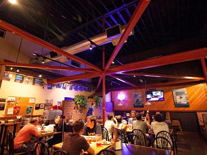 Where pizza memories are made – families and friends gathering under those signature wooden beams for the universal language of shared meals.