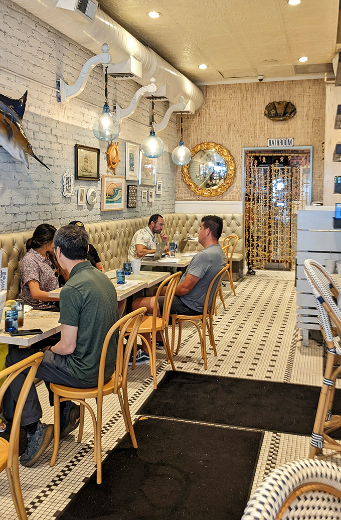 The dining room hums with that perfect energy of people united in the pursuit of exceptional seafood and good conversation.