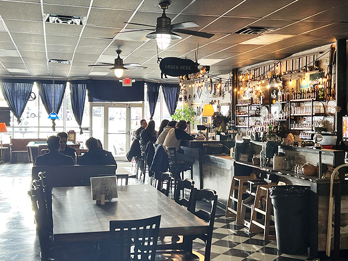 The bar area isn't just serving drinks &ndash; it's creating a community where strangers become friends over bourbon and BBQ.