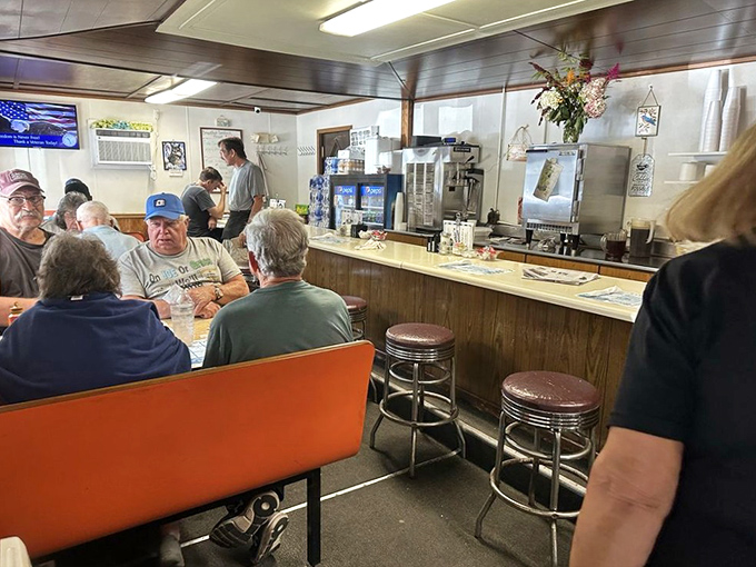 The counter where locals gather to solve the world's problems over endless cups of coffee and hearty conversation.