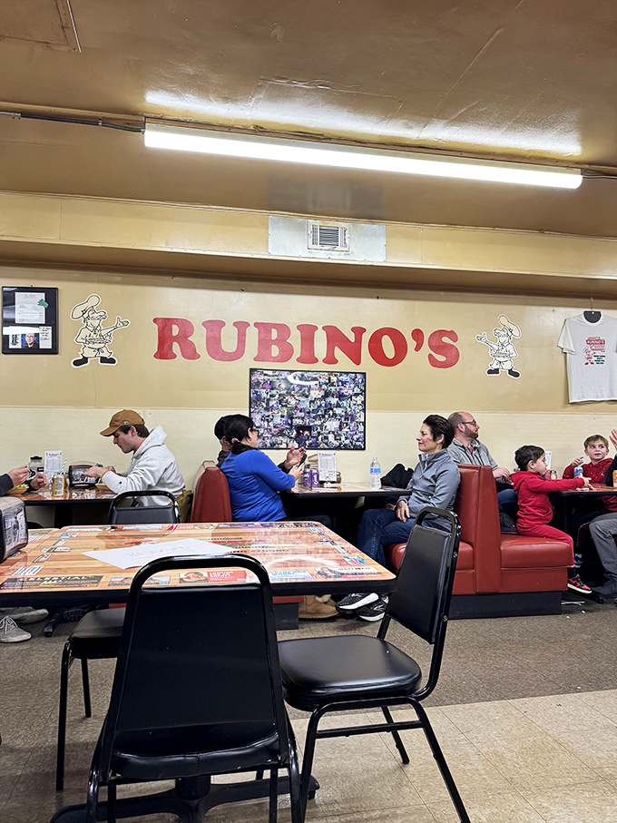 Families gather in these hallowed halls of pizza perfection, passing down the Rubino's tradition one square slice at a time.