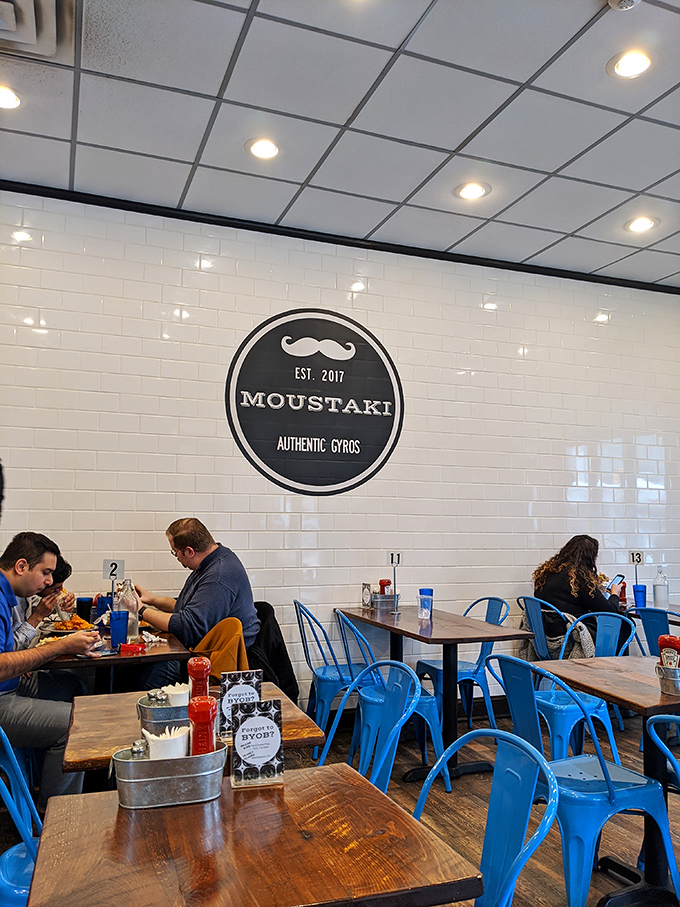 The dining room buzzes with the energy of happy eaters. Notice how nobody's looking at their phones? That's the power of truly good food.