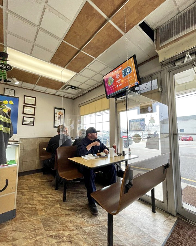 The dining area—where strangers become temporary neighbors united by the universal language of good food and the occasional knowing nod of satisfaction.