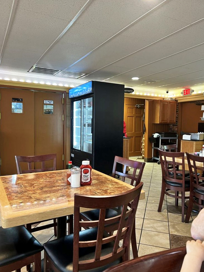 Where coffee cups are always full and conversations never empty. The diner's warm wood tones invite you to settle in and stay awhile.