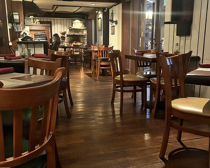 Polished wood floors and comfortable seating create an atmosphere where conversations flow as easily as the California wine.