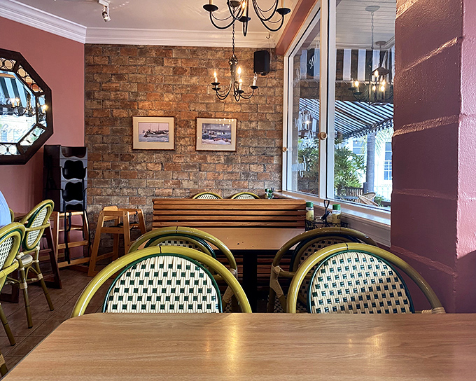 The dining room feels like your stylish friend's place&mdash;the one who actually bought matching furniture instead of collecting hand-me-downs.