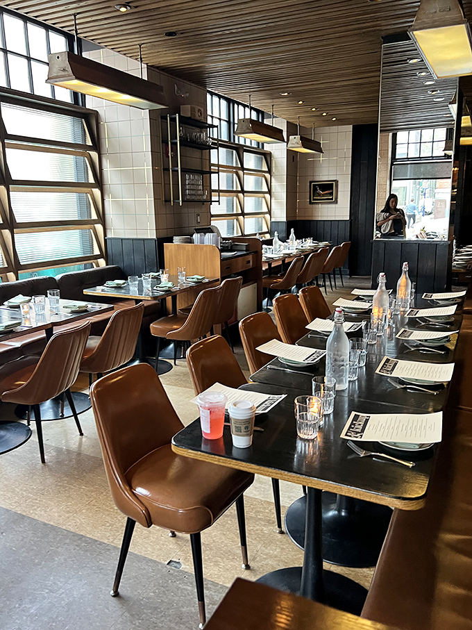 Tables set with anticipation, where mid-century design creates the perfect backdrop for thoroughly modern indulgence.