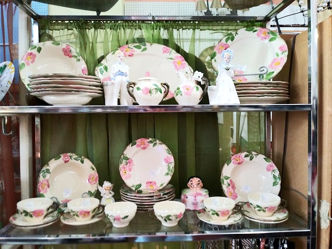 Floral dinnerware that survived countless family gatherings now waits for its second act. These dishes have seen more drama than your favorite soap opera.