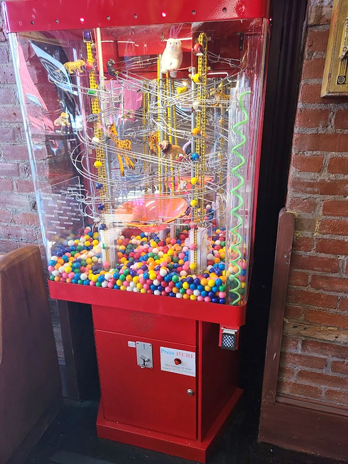 This isn't just a gumball machine&mdash;it's an engineering marvel, a Rube Goldberg of joy delivering small spheres of happiness.