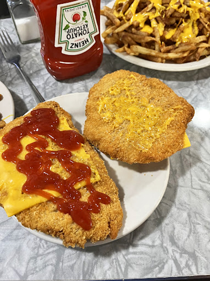 Breaded perfection meets melty American cheese. Like finding the last parking spot at the mall during holiday season&mdash;a victory worth celebrating.