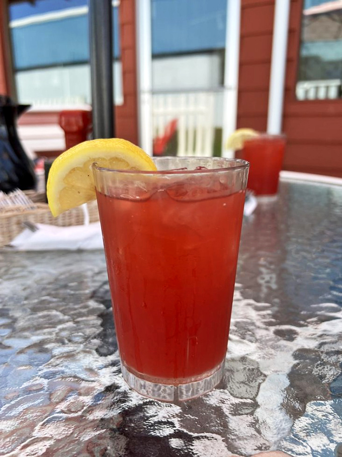 Cherry ade with a lemon wedge &ndash; summer in a glass. The perfect companion for watching boats drift by on Crystal Lake.