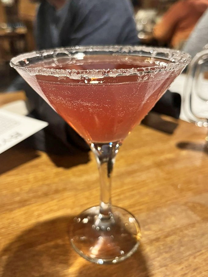 A cocktail that's dressed better than most people at the prom, with a sugar rim that's both decoration and dessert.