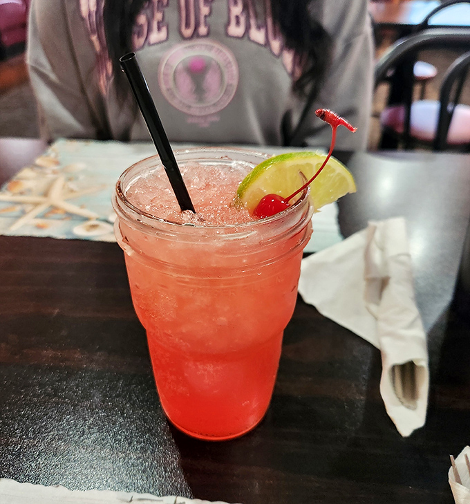 This isn't just a cocktail &ndash; it's a sunset in a glass, complete with that cherry on top saying "vacation starts now."