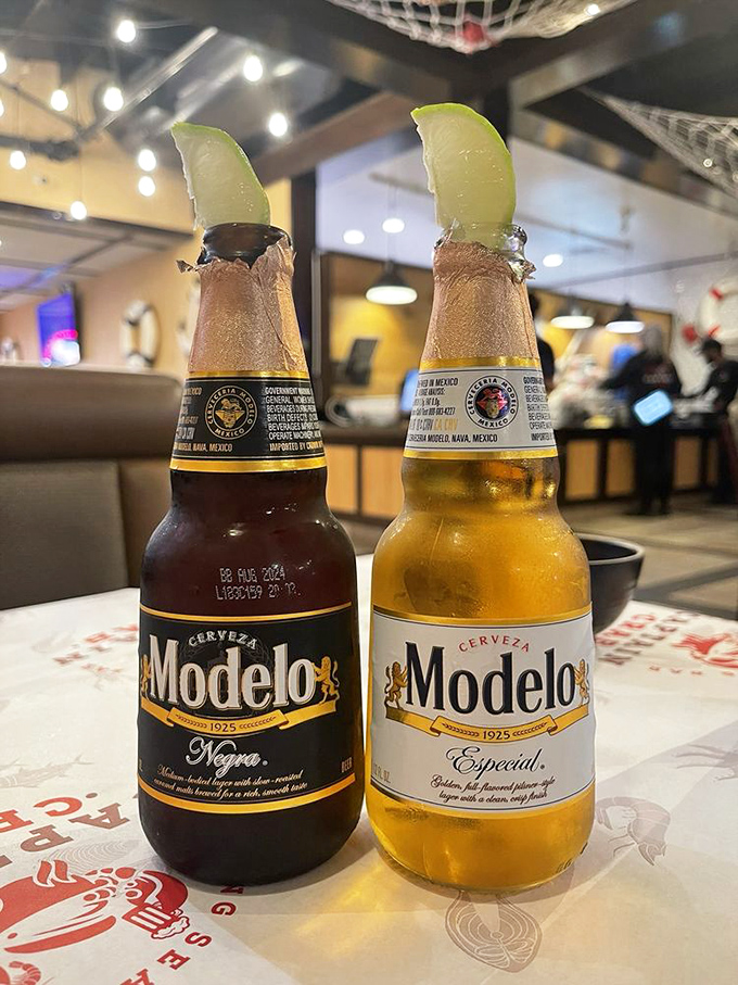 Two Modelos with lime&mdash;the perfect palate cleansers between bites of spicy seafood. Beer diplomacy at its finest.