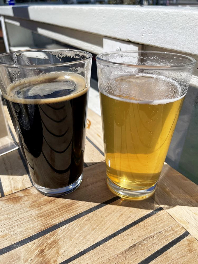 Two beers on a sun-dappled table with the water just beyond&mdash;proof that sometimes the simplest pleasures are the ones that stick with you longest.