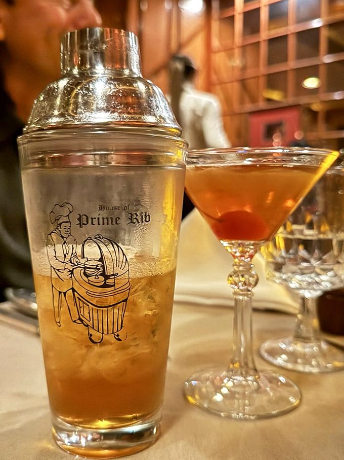 Classic cocktails served in proper glassware&mdash;because your Manhattan deserves better than a plastic cup. The martini shaker hints at proper priorities.