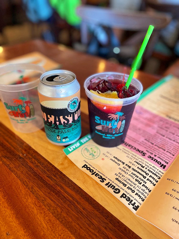 The holy trinity of beach dining: local craft beer, fruity cocktail, and a menu promising treasures from the deep. Vacation mode: activated.