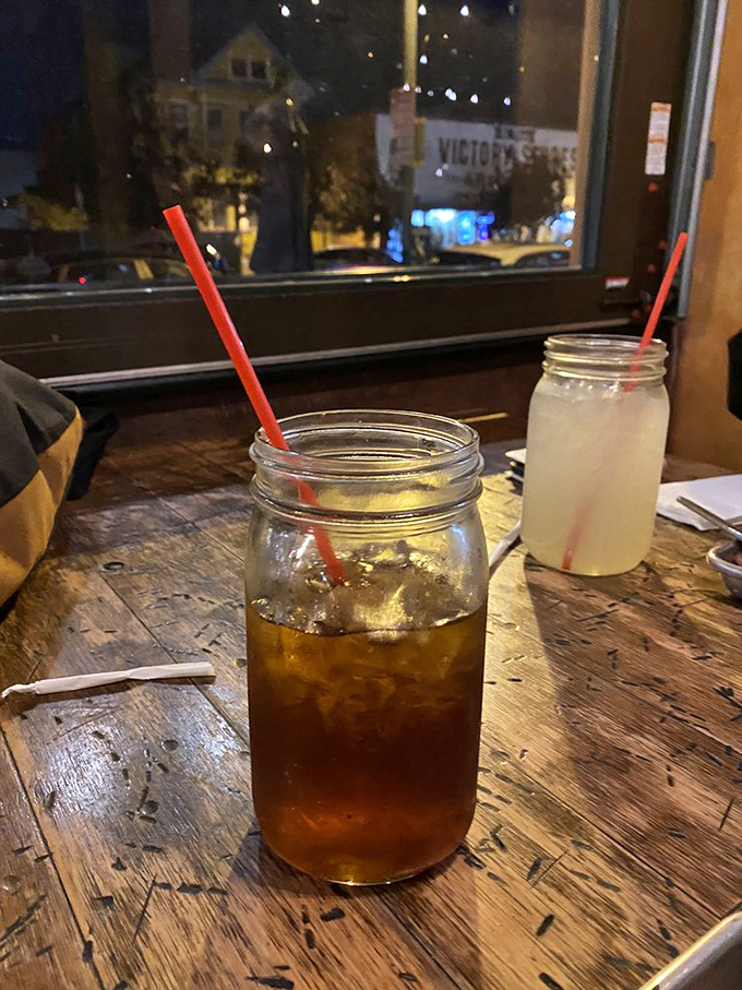 Sweet tea in mason jars&mdash;the unofficial state beverage of "y'all come back now." That weathered wooden table has heard a thousand satisfied sighs.