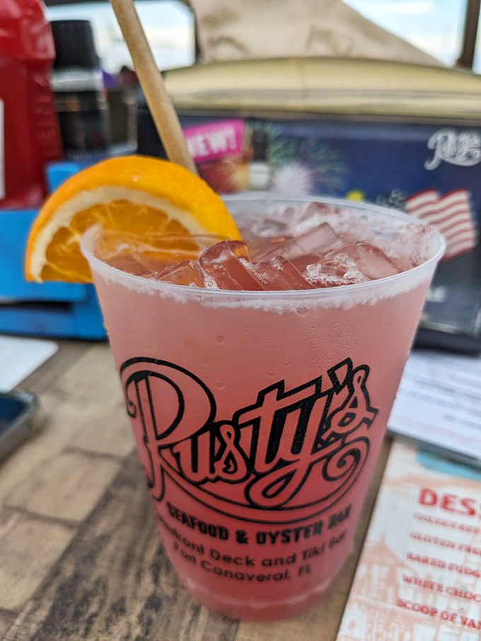 This isn't just a cocktail; it's a vacation in a glass, complete with that rosy hue that whispers, "Your worries end here."