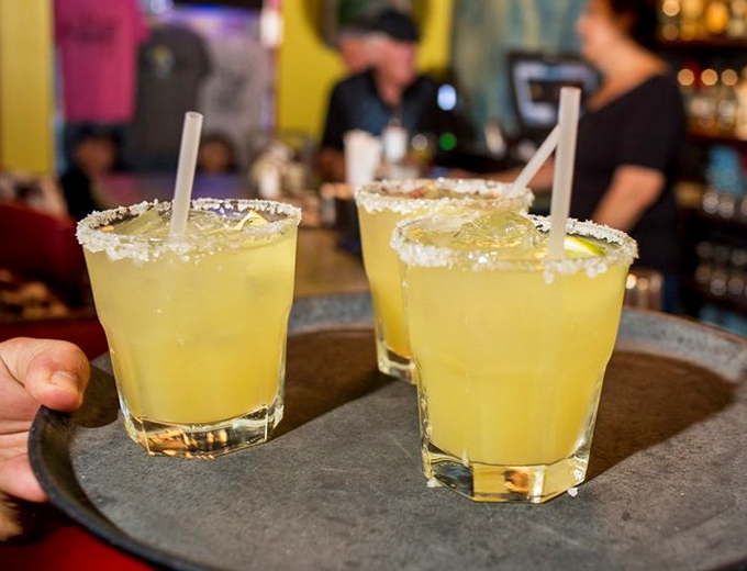 Margaritas with salt-rimmed attitude! These sunshine-yellow beauties aren't just drinks&mdash;they're liquid permission slips to relax and stay awhile.