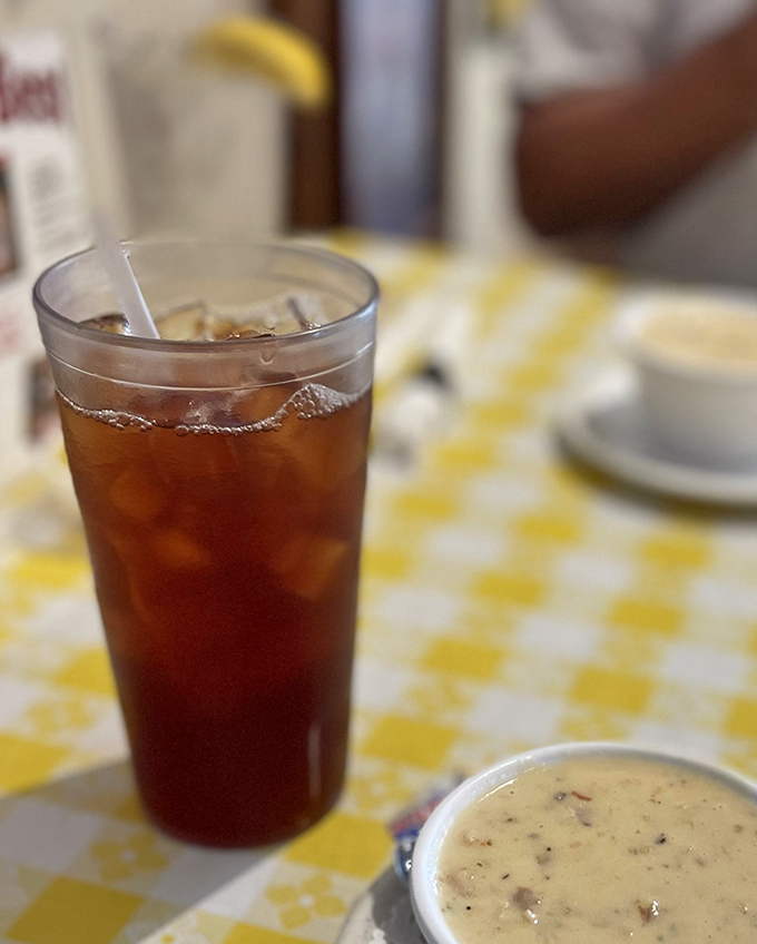 Sweet tea and chowder&mdash;a pairing that bridges North and South in delicious harmony. That yellow checkered tablecloth adds just the right touch of homestyle comfort.
