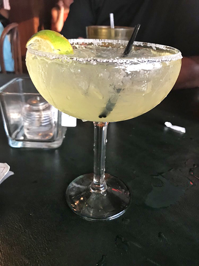 A proper margarita with salt-crusted rim and lime&mdash;because sometimes you need something stronger than sweet tea to wash down that tenderloin. Vacation in a glass.