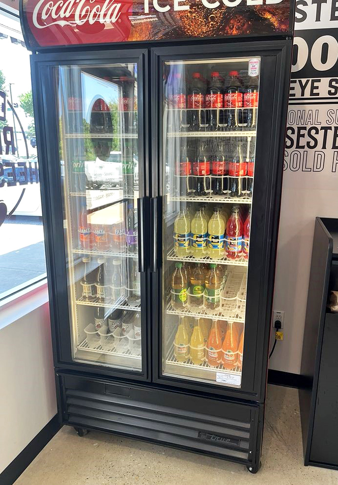 The beverage cooler stands ready, like a refreshment oasis after your trek through flavor country. Cold drinks await the cheesesteak-parched.