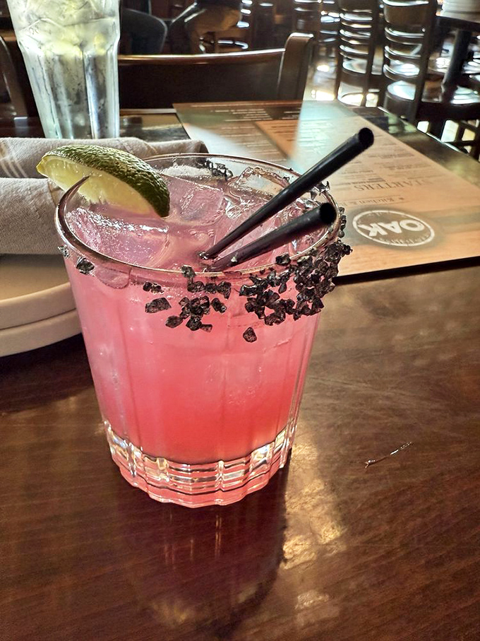 This isn't just a pretty pink drink&mdash;it's summer in a glass, with that black salt rim adding the perfect dramatic flair for your Instagram and your taste buds.