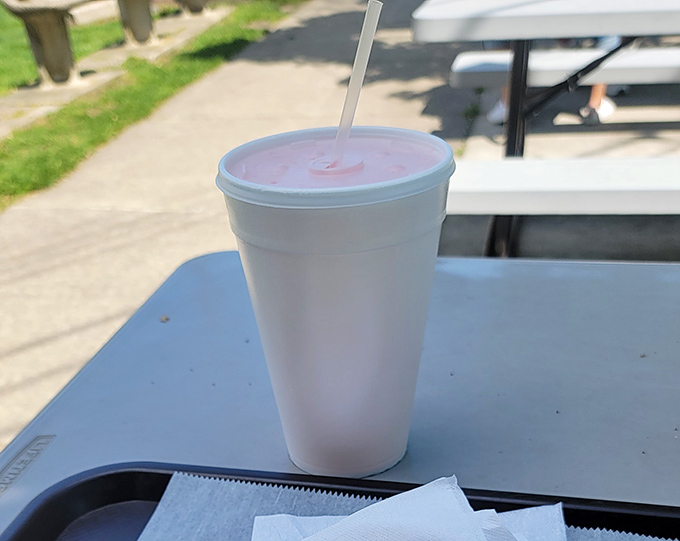 Simple pleasures in a styrofoam cup. Whatever your beverage of choice, it somehow tastes better when accompanied by Lipuma's legendary dogs.