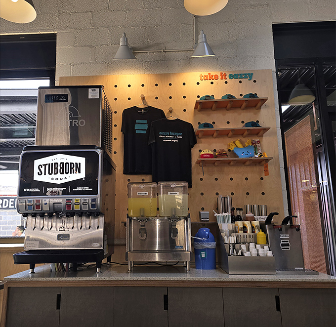The drink station isn't just functional&mdash;it's where your Stubborn Soda meets merchandise that lets you take the Eazzy vibe home.
