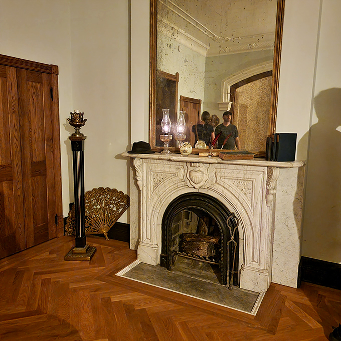 A marble fireplace that's witnessed decades of Cleveland winters. The ornate carving and classic oil lamps transport you straight to the Gilded Age.
