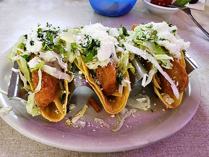 These fish tacos aren't just a meal, they're a beach vacation for your taste buds &ndash; crispy fish, fresh cabbage, and a sprinkle of cotija cheese.