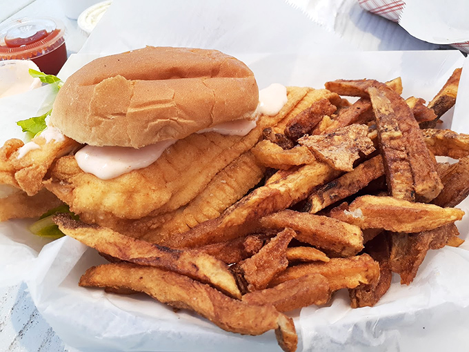 This flounder sandwich proves that sometimes the best meals come wrapped in the simplest, most honest presentation.